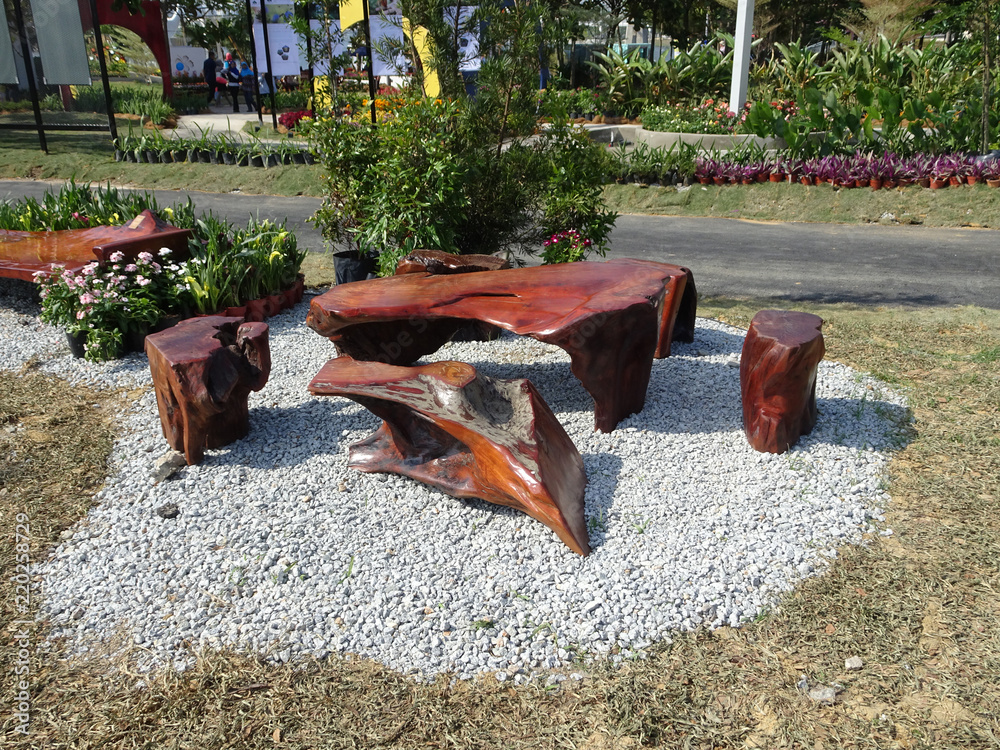 Tables and benches made of wood stumps and used wood. Designer ...