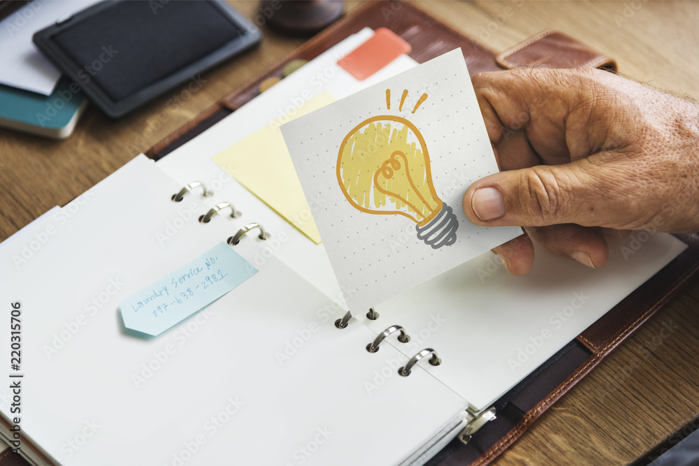 Light bulb drawing on a sticky note Stock Photo | Adobe Stock
