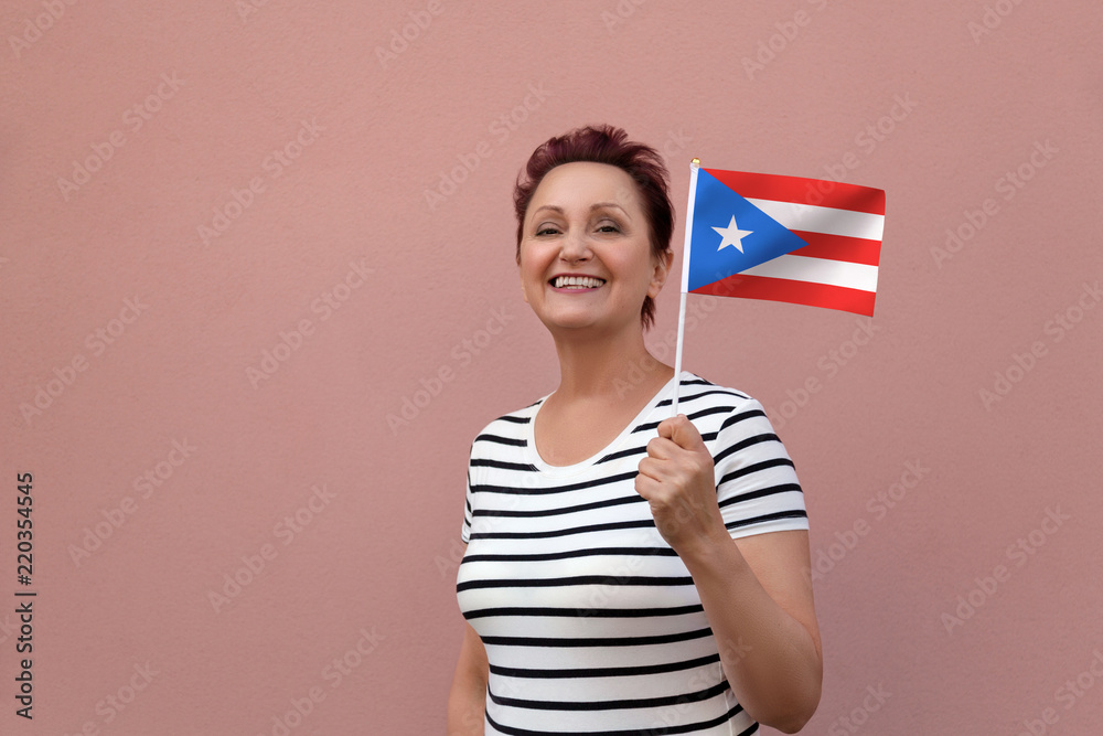 Puerto Rico flag. Woman holding Puerto Rico flag. Nice portrait of ...