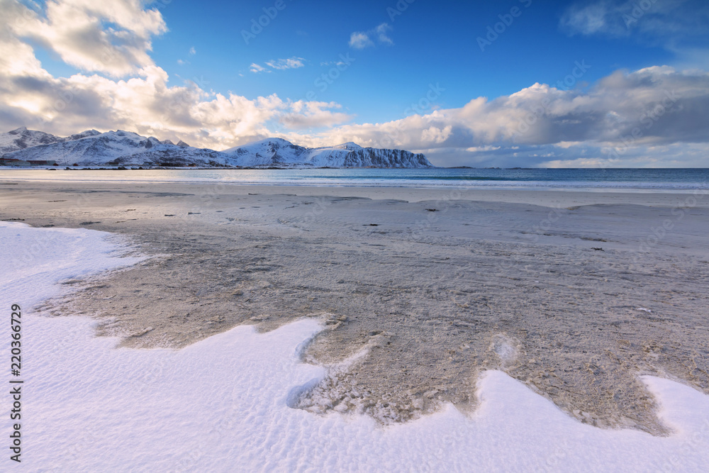 Snow on sandy beach, Ramberg, Flakstad municipality, Lofoten Islands ...