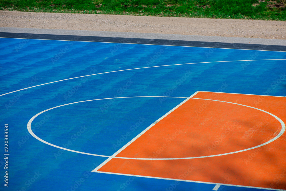 Abstract, blue background of newly made outdoor basketball court in ...