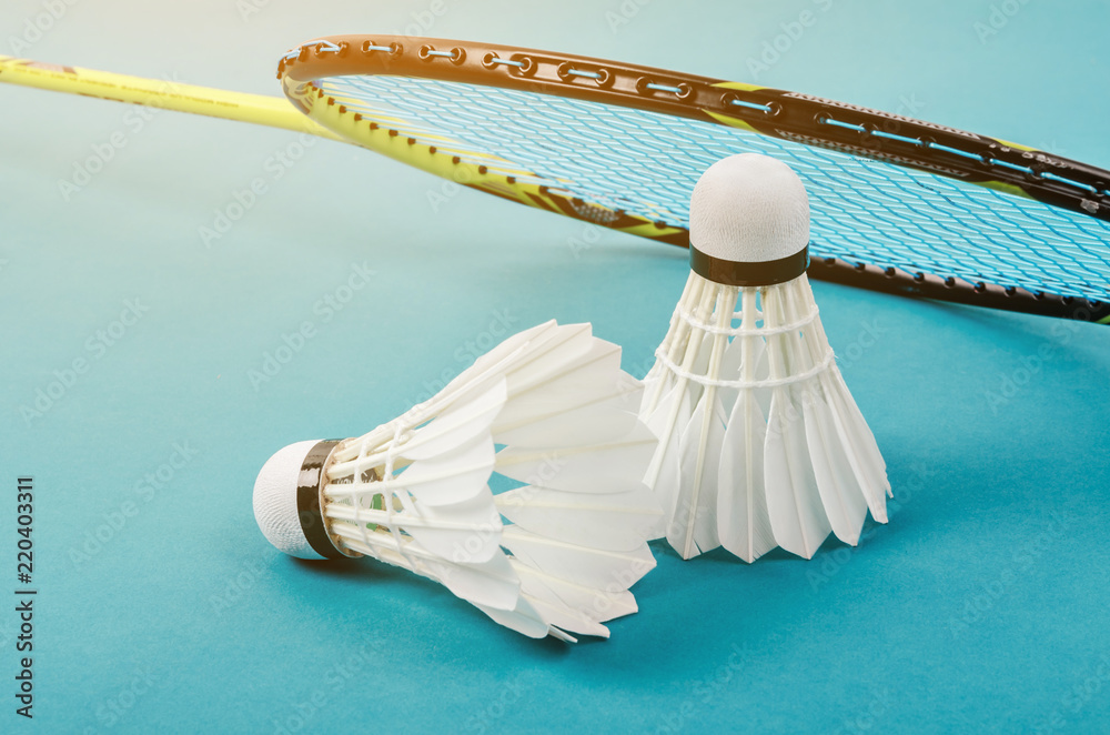 shuttlecock and badminton racket. Stock Photo | Adobe Stock