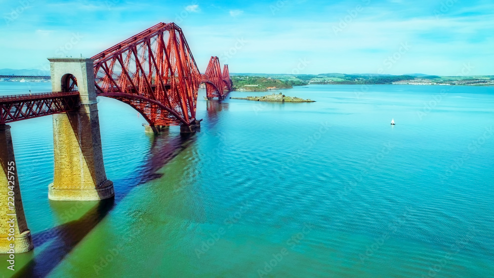Aerial view of the Forth Railway Bridge near Edinburgh. A huge ...