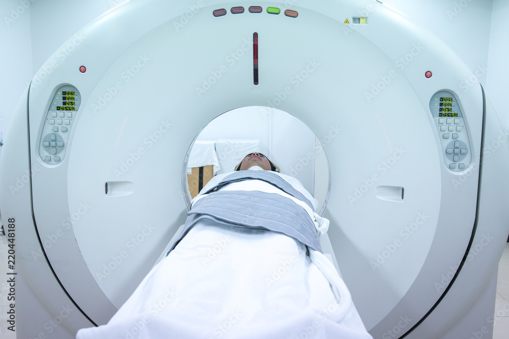 Process of CT scanning of an old patient. Man Receiving a Medical Scan ...