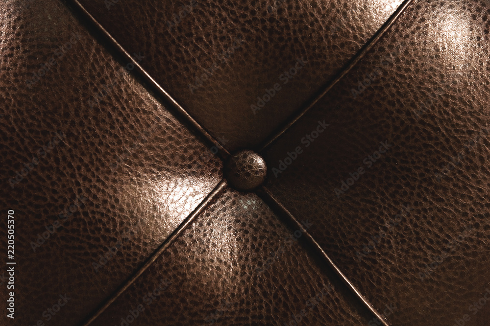 Surface of a rhombic split skin with buttons on the back of the bed ...