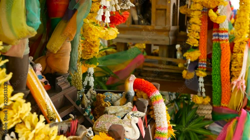 Wooden miniature guardian spirit house. Small buddhist temple shrine ...