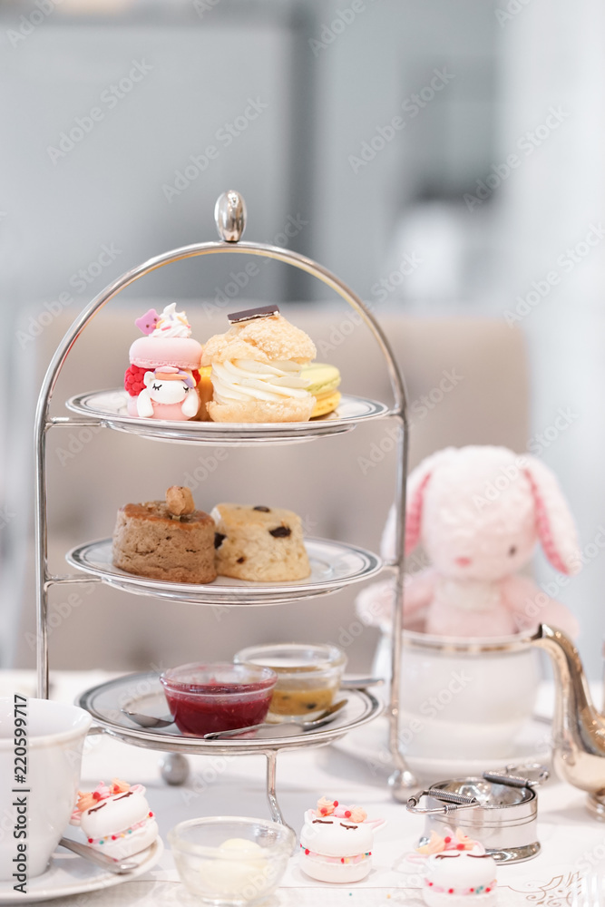 afternoon tea set. A tea time with cute unicorn macarons and a cute ...