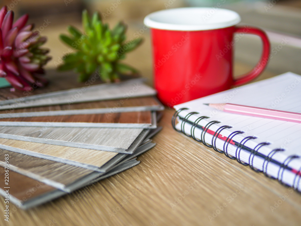 stack of click lock vinyl floor tiles sample on vinyl shop desk Stock ...