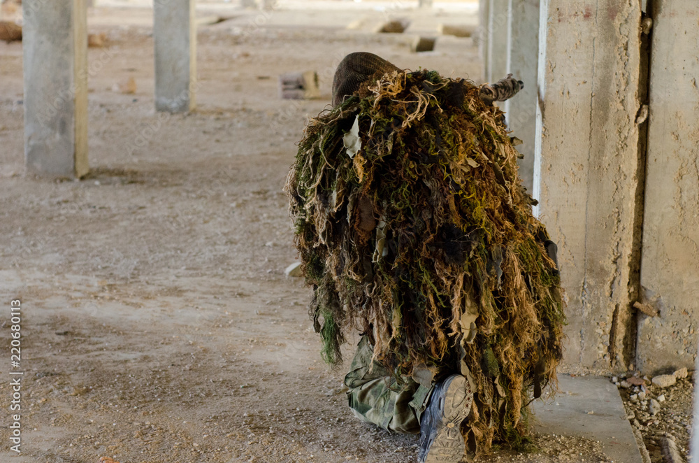Sniper kneeling supported firing position back view Stock Photo | Adobe ...