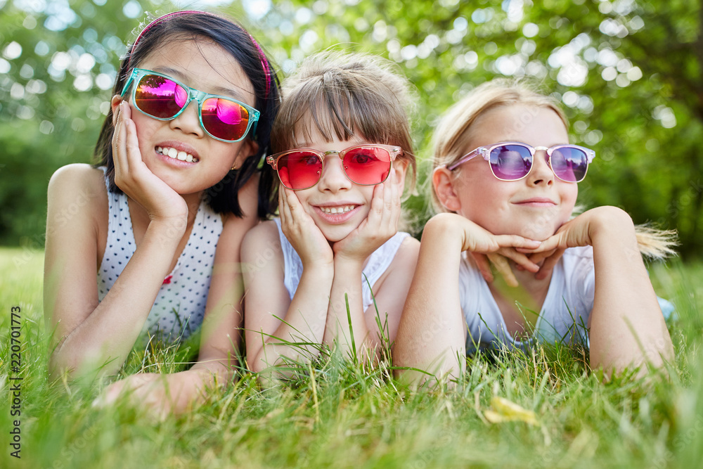 Three cool girls with sunglasses Stock Photo | Adobe Stock