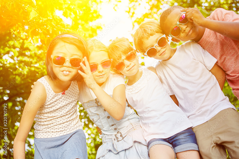 Cool group of children as friends Stock Photo | Adobe Stock