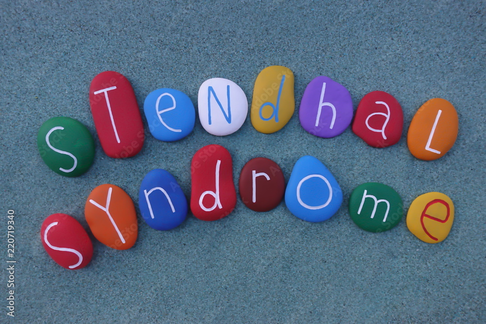 Stendhal Syndrome text with colored stones over green sand Stock Photo ...