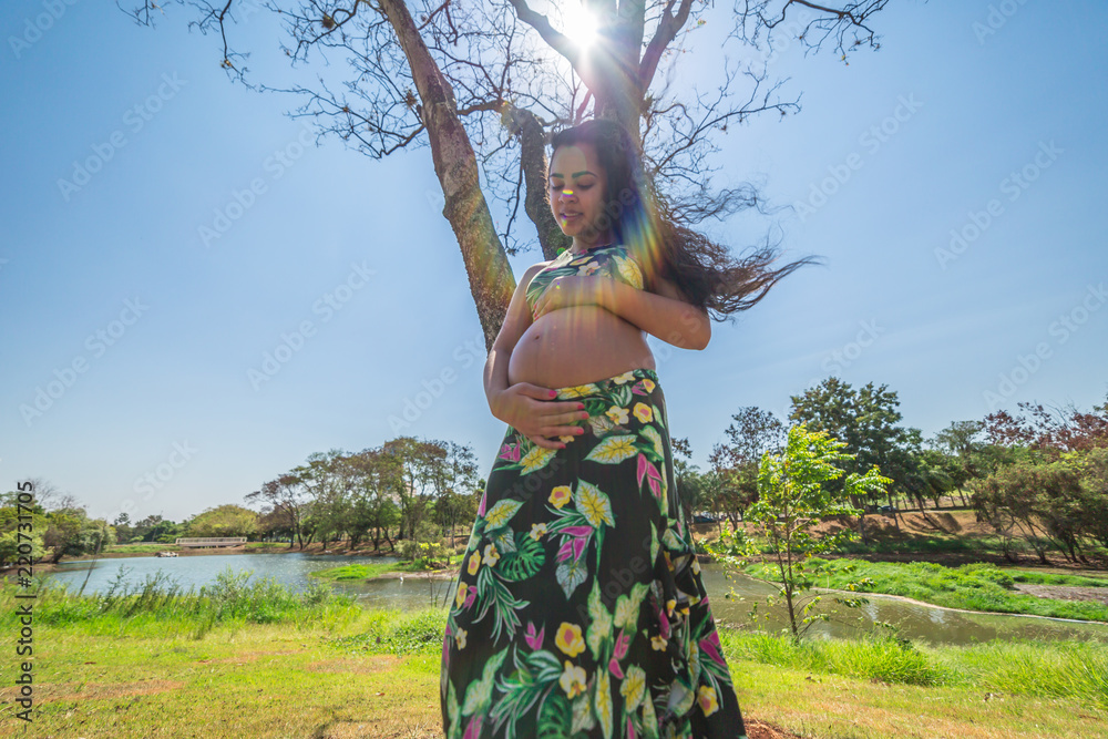Cute Pregnant On Natural Background Young Pregnant Woman Embracing Her
