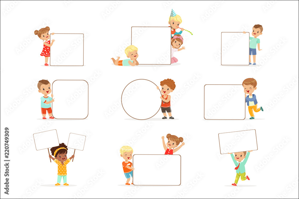 Smiling kids standing with white blank boards set. Happy little boys ...