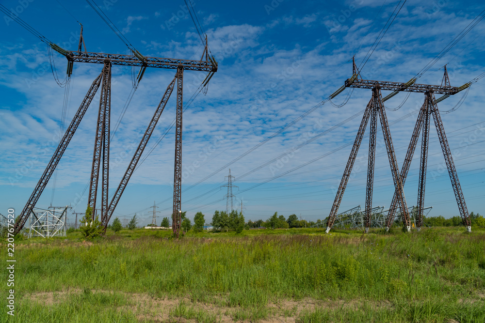 New poles for power lines lying on the ground. For the next ...