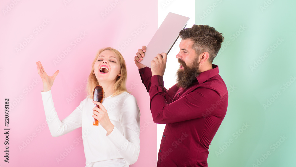 Singing is her passion. Lady sing using hair brush as microphone while ...
