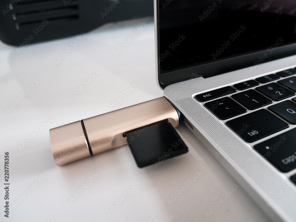 USB Type-C Memory Card Reader Attached to Laptop Stock Photo | Adobe Stock