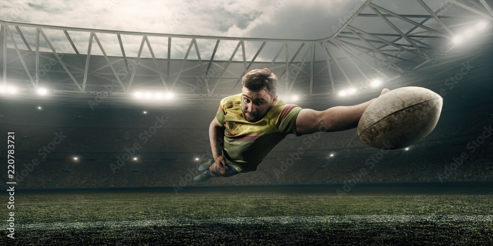 Dirty rugby player catch the ball in flight on professional rugby ...