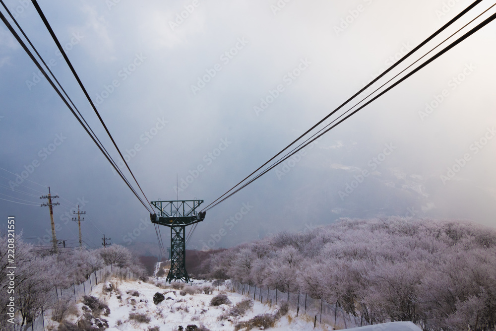 The beppu ropeway was built to withstand the turbulent climate. It is ...