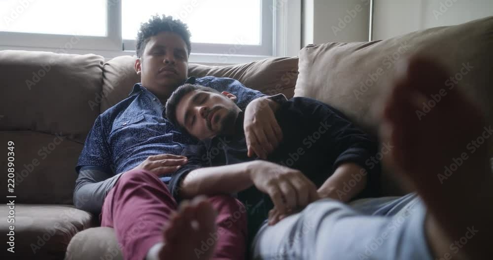 Young Gay Men Sleeping And Relaxing On Sofa At Home Stock Video | Adobe ...