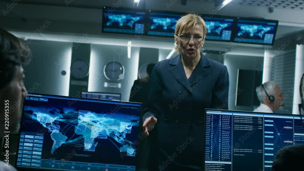 Female Chief Operative Officer talks to Cyber Security Dispatchers ...