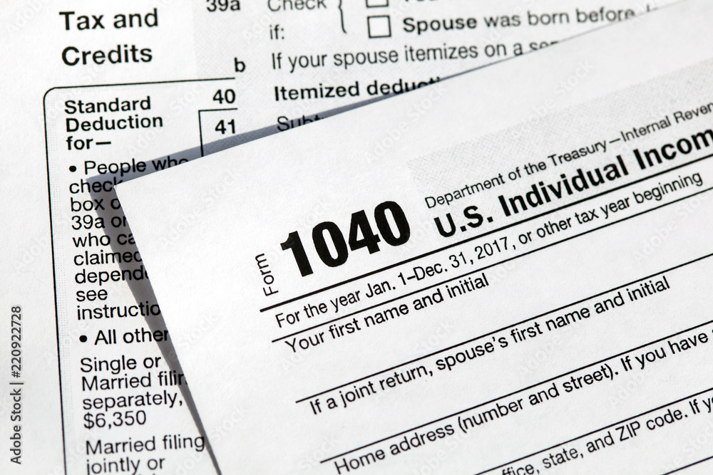 Tax form 1040 for US individual tax return. Close-up Photos | Adobe Stock