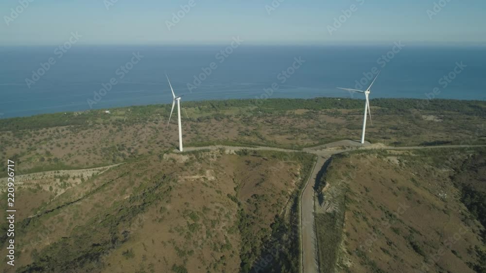 Aerial view of Windmills for electric power production on the seashore ...