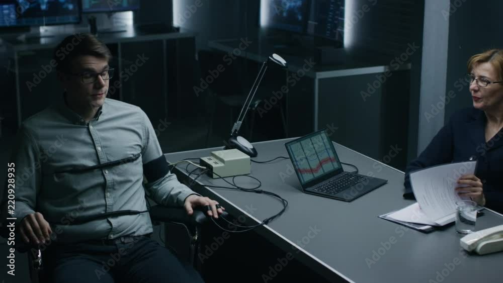 Female Special Agent Conducts Lie Detector / Polygraph Test on a Young ...
