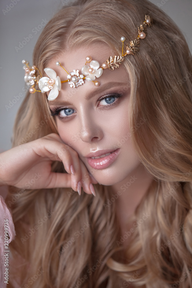 Delicate portrait of a young model girl. The image of the bride, a ...