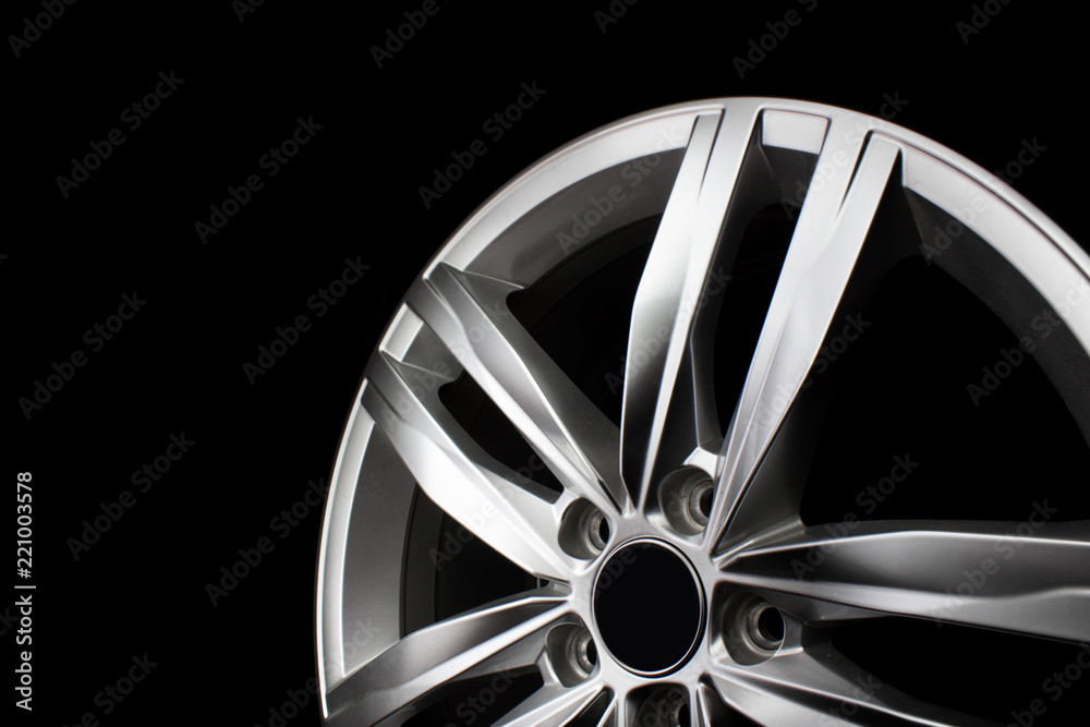 Aluminum metal wheel rim texture. Car alloy wheel, isolated on black ...