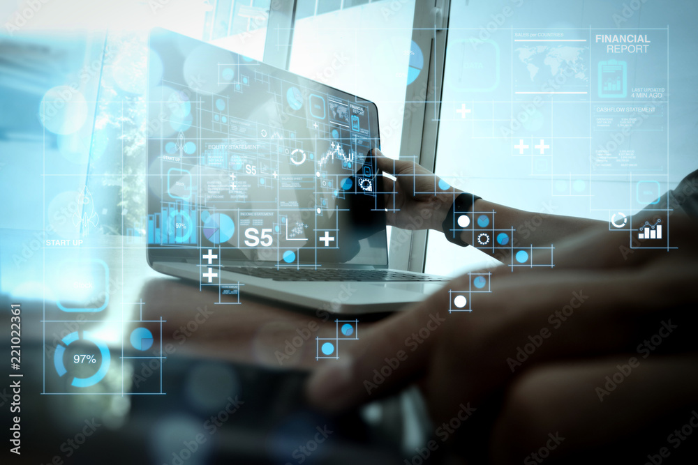 businessman hand working with modern technology and digital layer ...