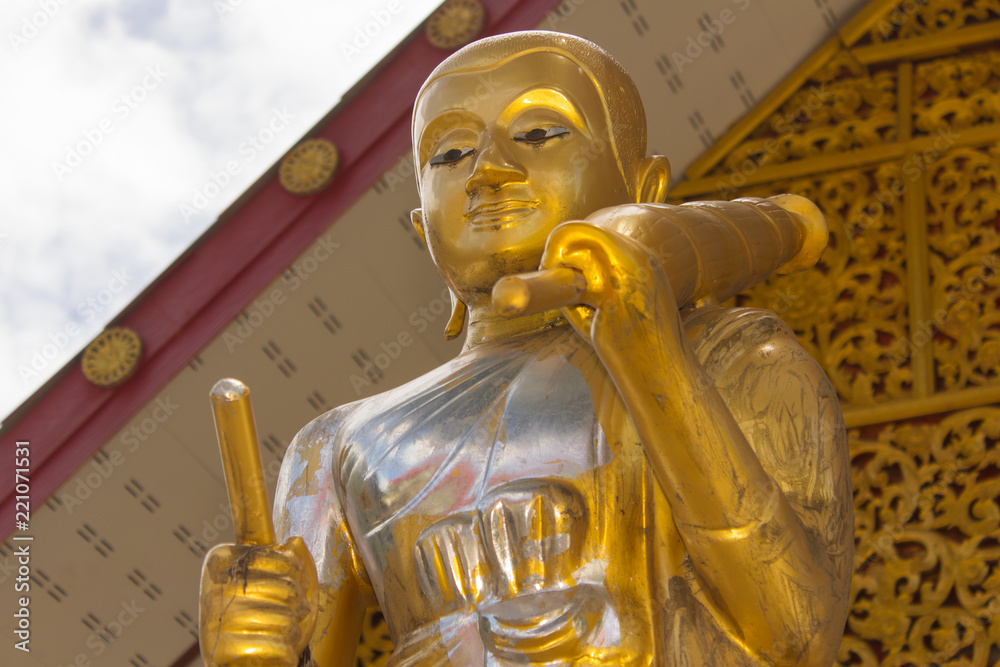 golden thai monk statue in temple Stock Photo | Adobe Stock