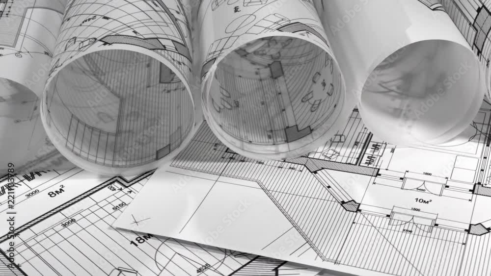 Blueprints - rolls of architectural drawings smoothly rotate on the ...