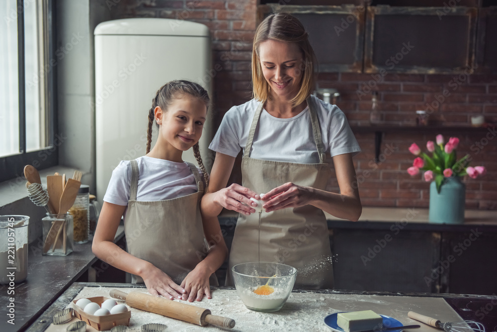 Mom and daughter baking Stock Photo | Adobe Stock