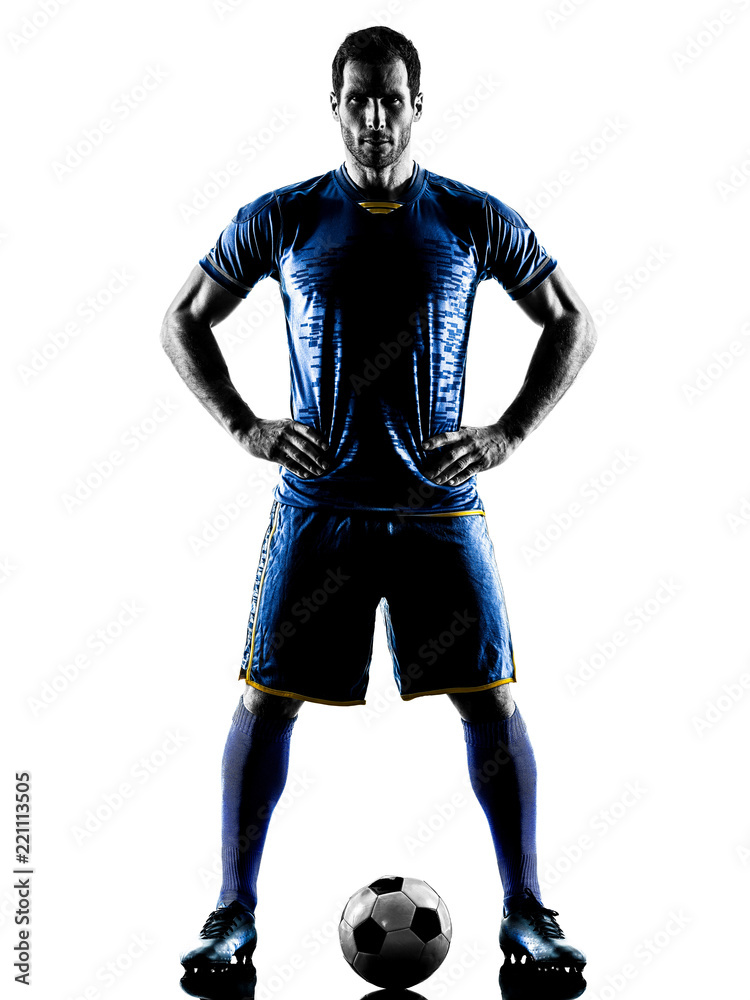 one caucasian soccer player man standing in silhouette isolated on ...