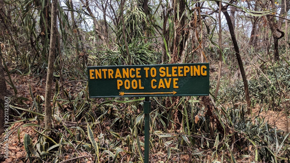 A sign board for entrance to sleeping pool cave, Chinoyi Caves ...