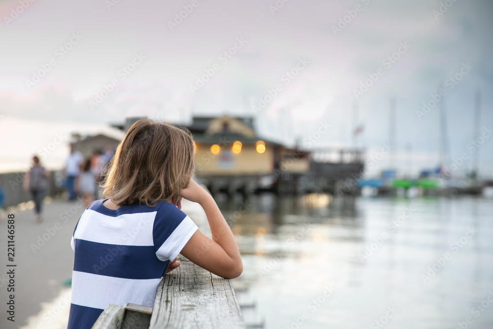 Child Tween Girl on Pier Looking out to Sea Pondering Future Stock ...