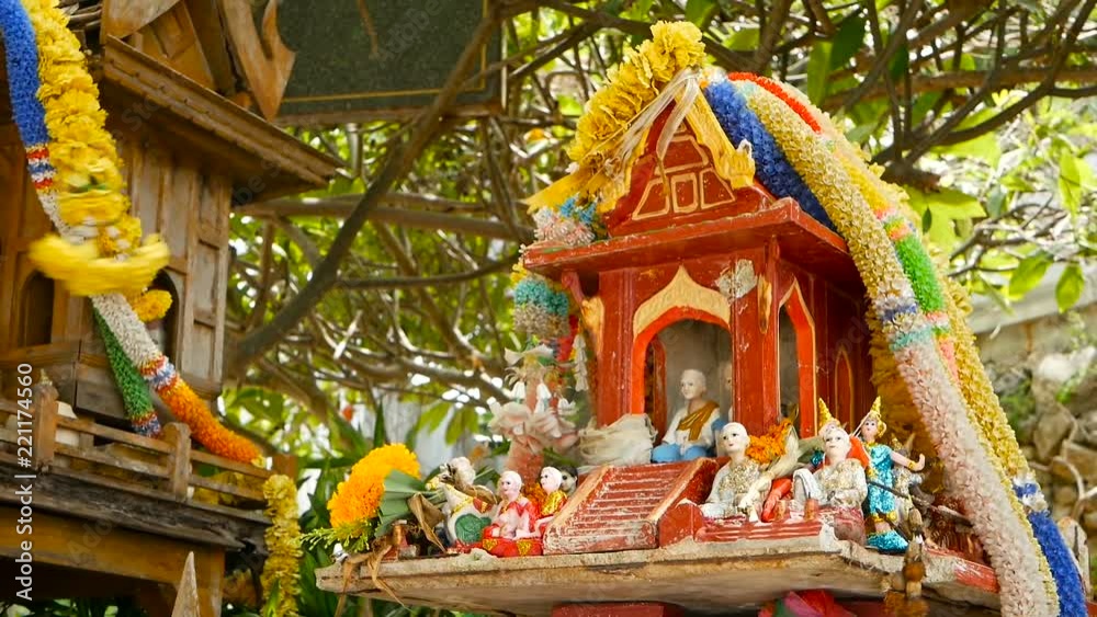 Wooden miniature guardian spirit house. Small buddhist temple shrine ...