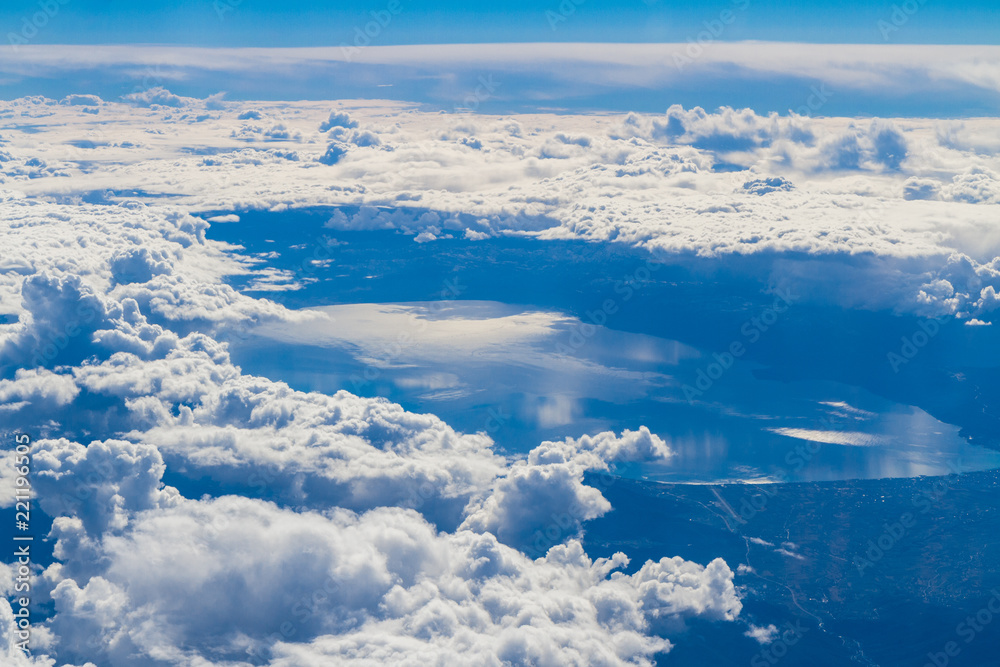 Blue planet Earth seen from high above through an airplane window ...