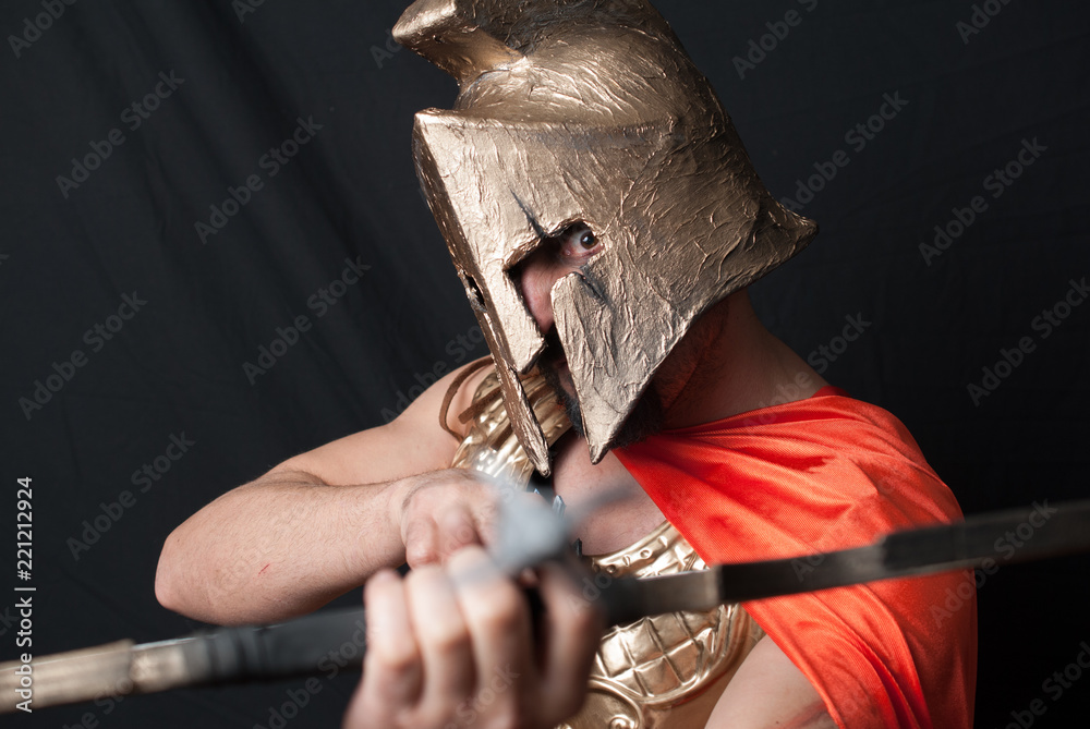 Customized model as a roman soldier in studio with black background ...