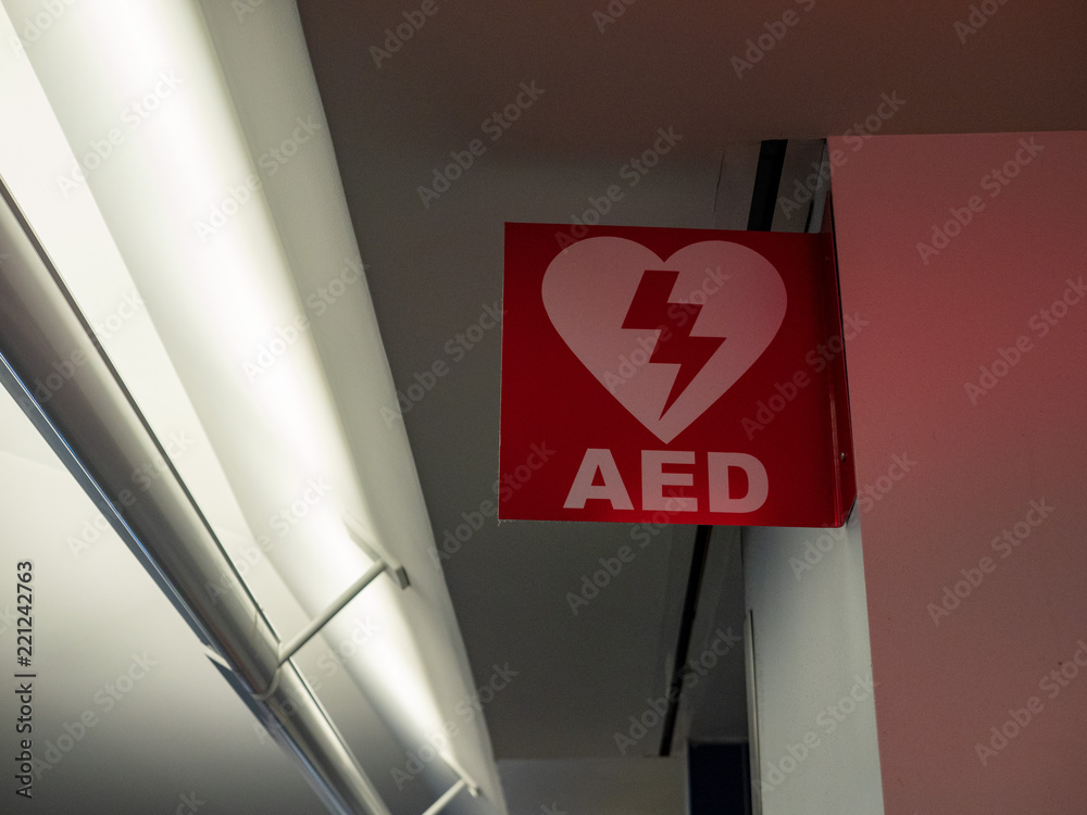 Automated external defibrillator AED logo hanging in public area Stock ...