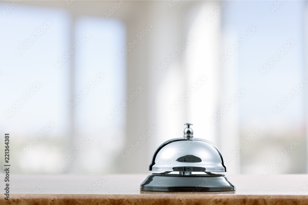 Vintage hotel reception service desk bell. Stock Photo | Adobe Stock