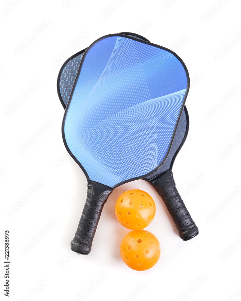 Pickleball paddle and ball on white Stock Photo | Adobe Stock