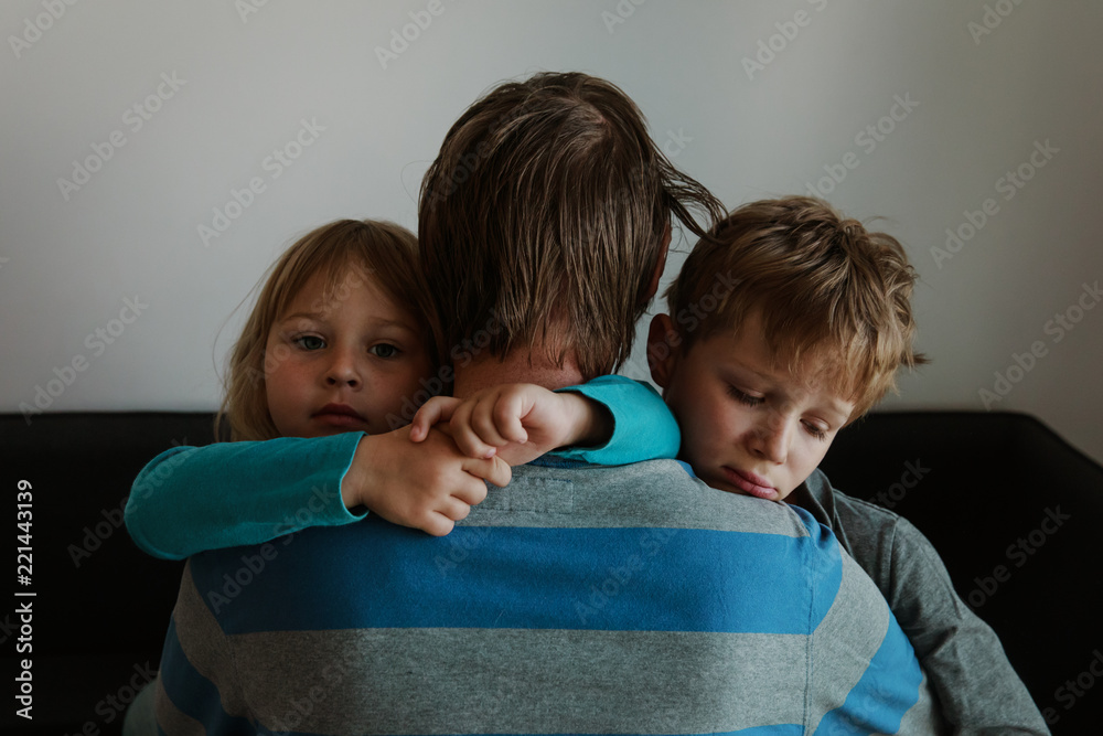 Sad Family Hugging