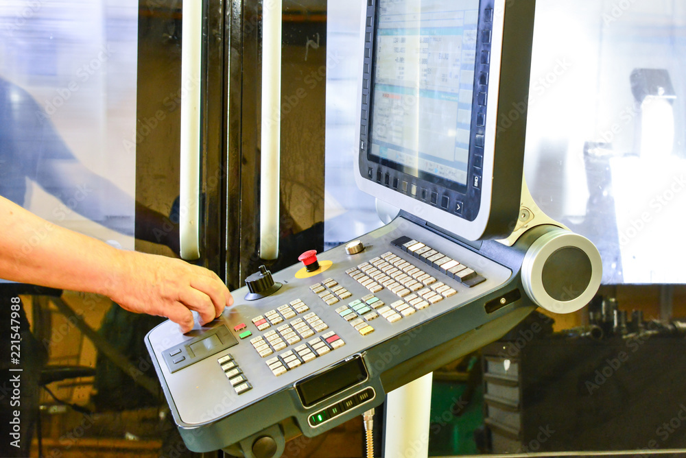 Worker, operator of the control panel of the program of operation of a ...