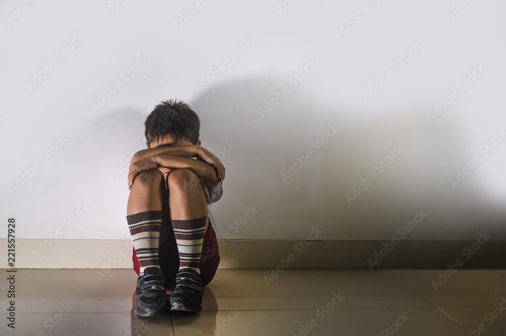 bullying victim portrait of young sad and scared kid in school uniform ...