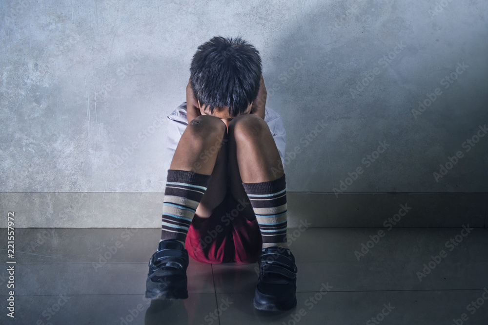 bullying victim portrait of young sad and scared kid in school uniform ...