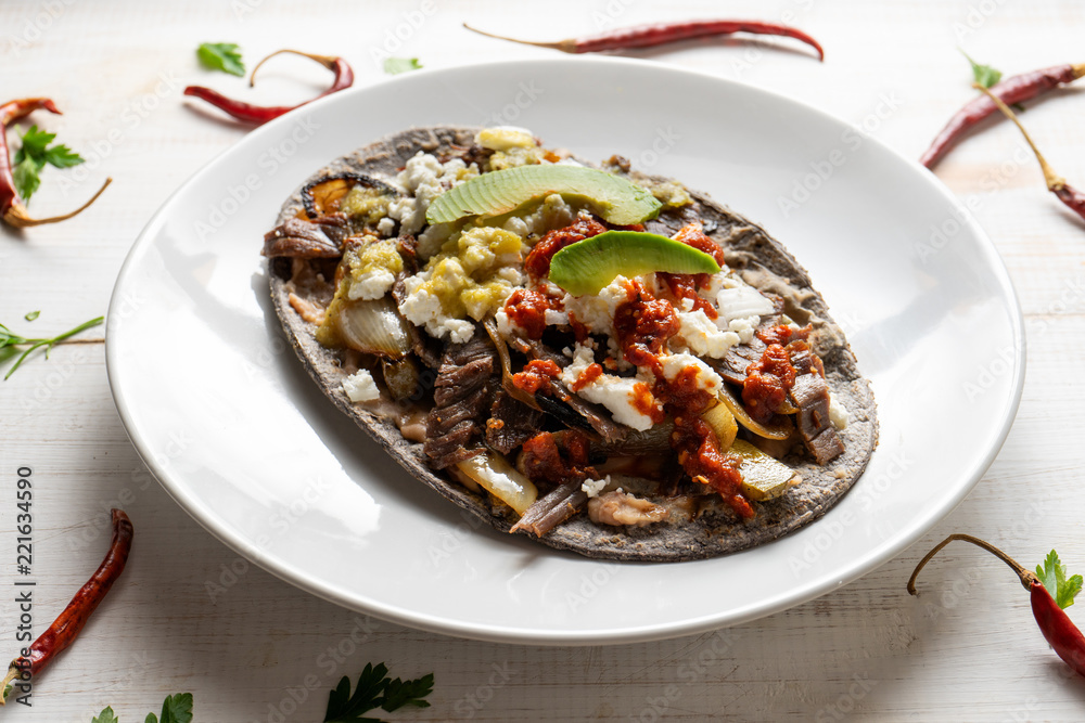 Mexican huarache of cecina beef foto de Stock | Adobe Stock