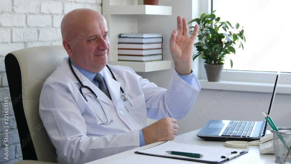 Doctor Image in Medical Cabinet Make Ok Hand Sign a Good Job Gestures ...