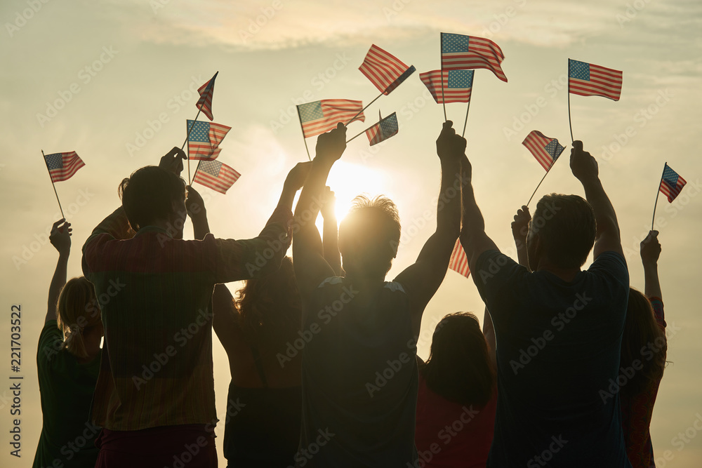 Group of people waving American flags. Silhouette of people with usa ...